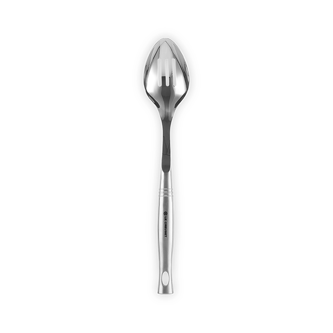 Stainless Steel Revolution® Slotted Spoon | Le Creuset